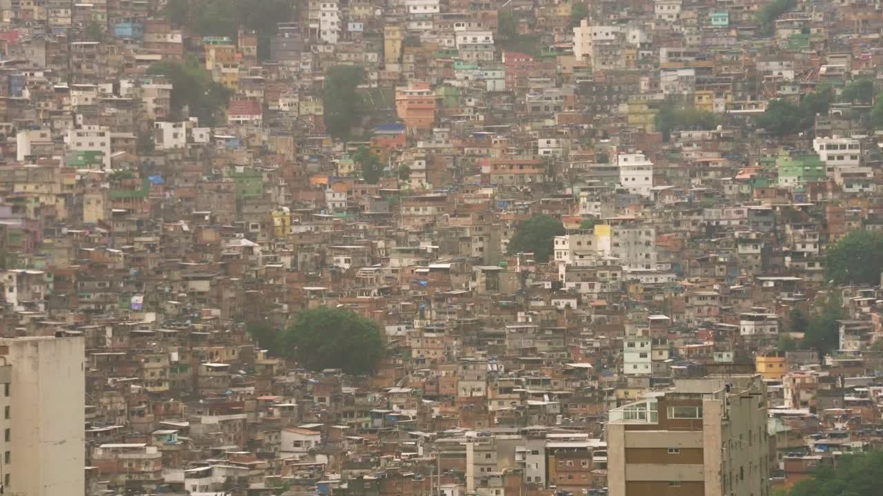 Static wide shot showing famous dense Rocinha Favela with colorful ...