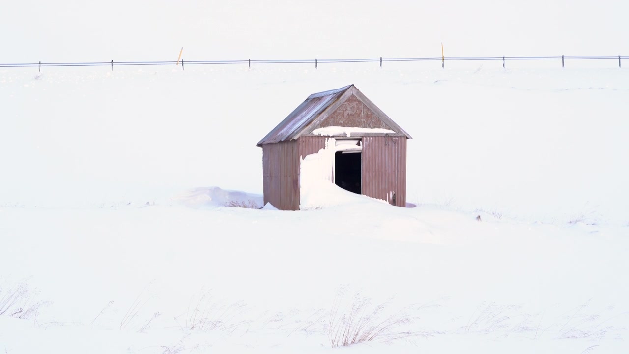 Snowy abandoned hut in the middle of nowhere, mountain background ...