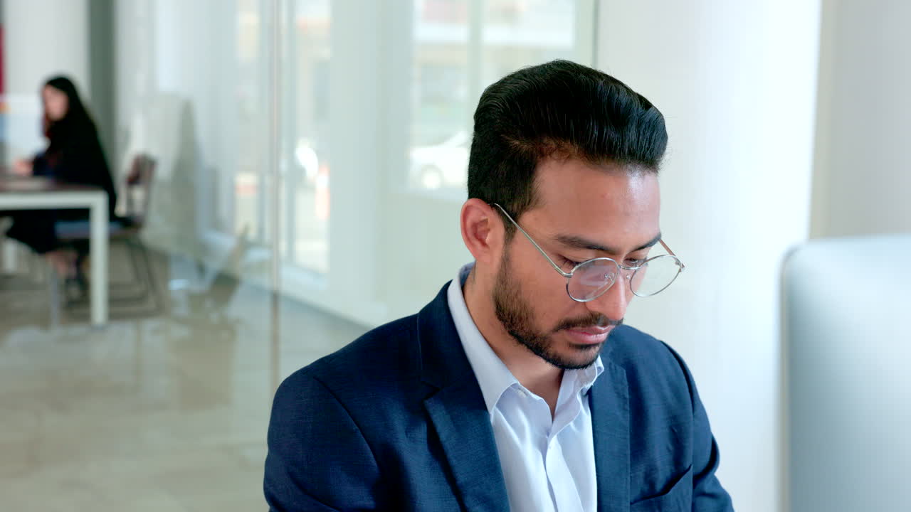 Premium stock video - Focused male academic researcher enjoying