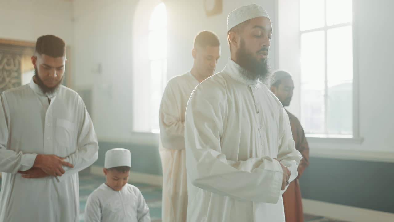 Islam, people and praying together in mosque | Premium Stock Video Footage