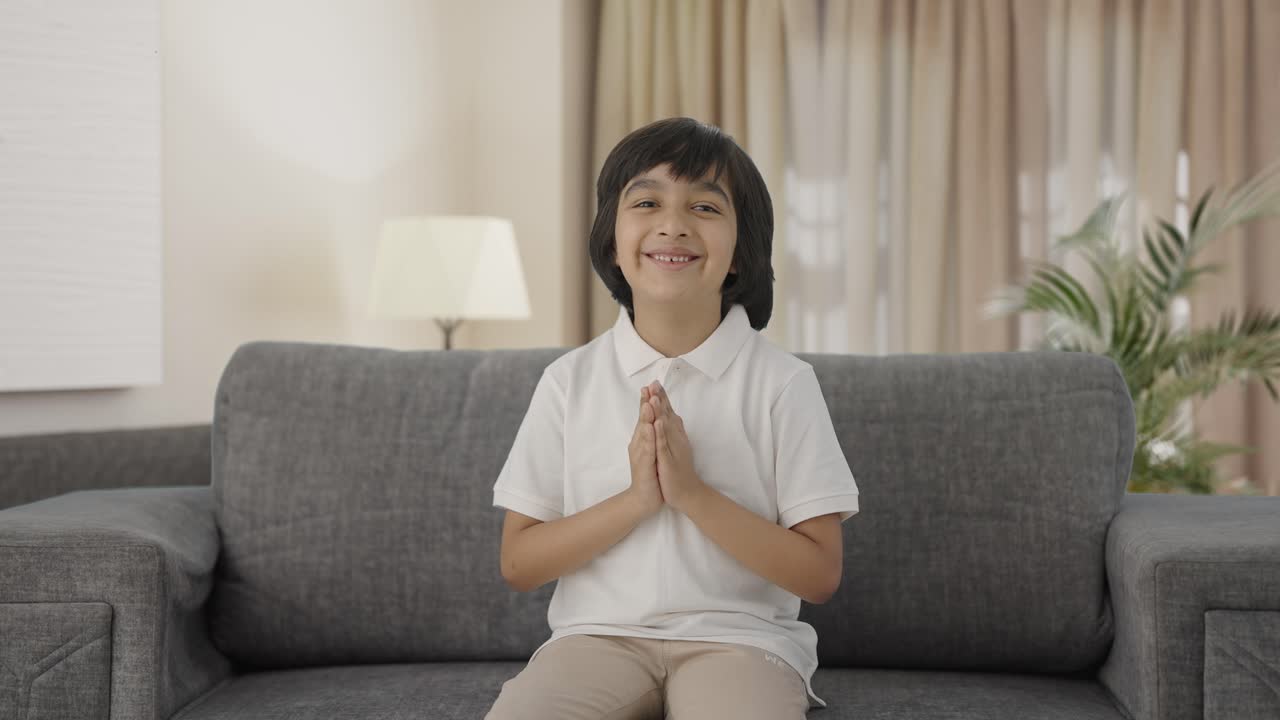 Cute Indian Boy Doing Namaste And Greetings Free Stock Video Footage ...
