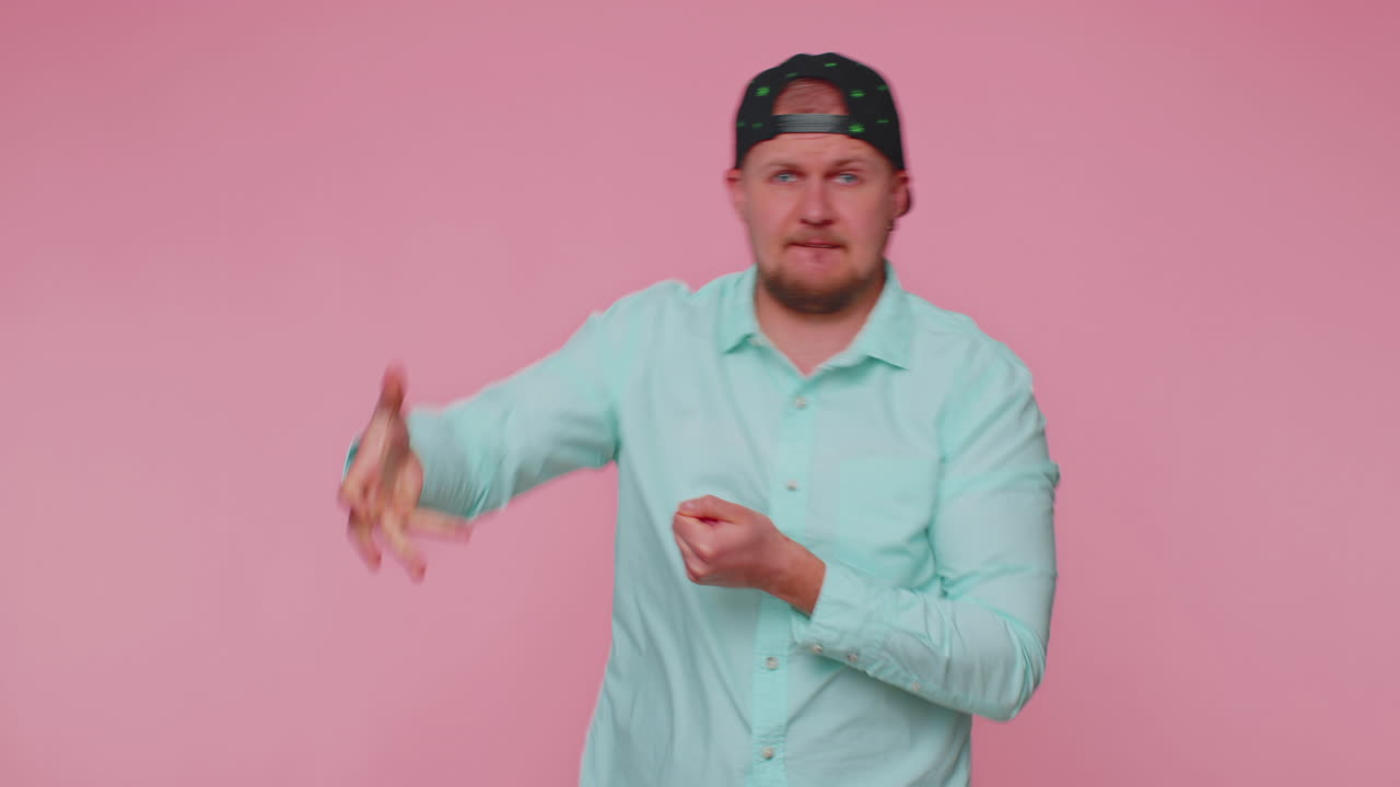 Mime Young Adult Man Pulling An Imaginary Unreal Invisible Rope Showing ...