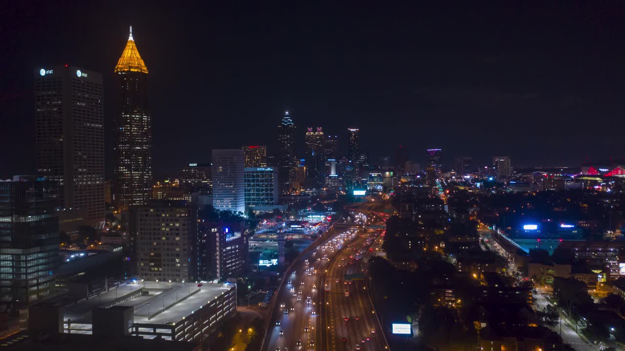 Rising altitude time lapse of the atlanta connector shot from a drone ...