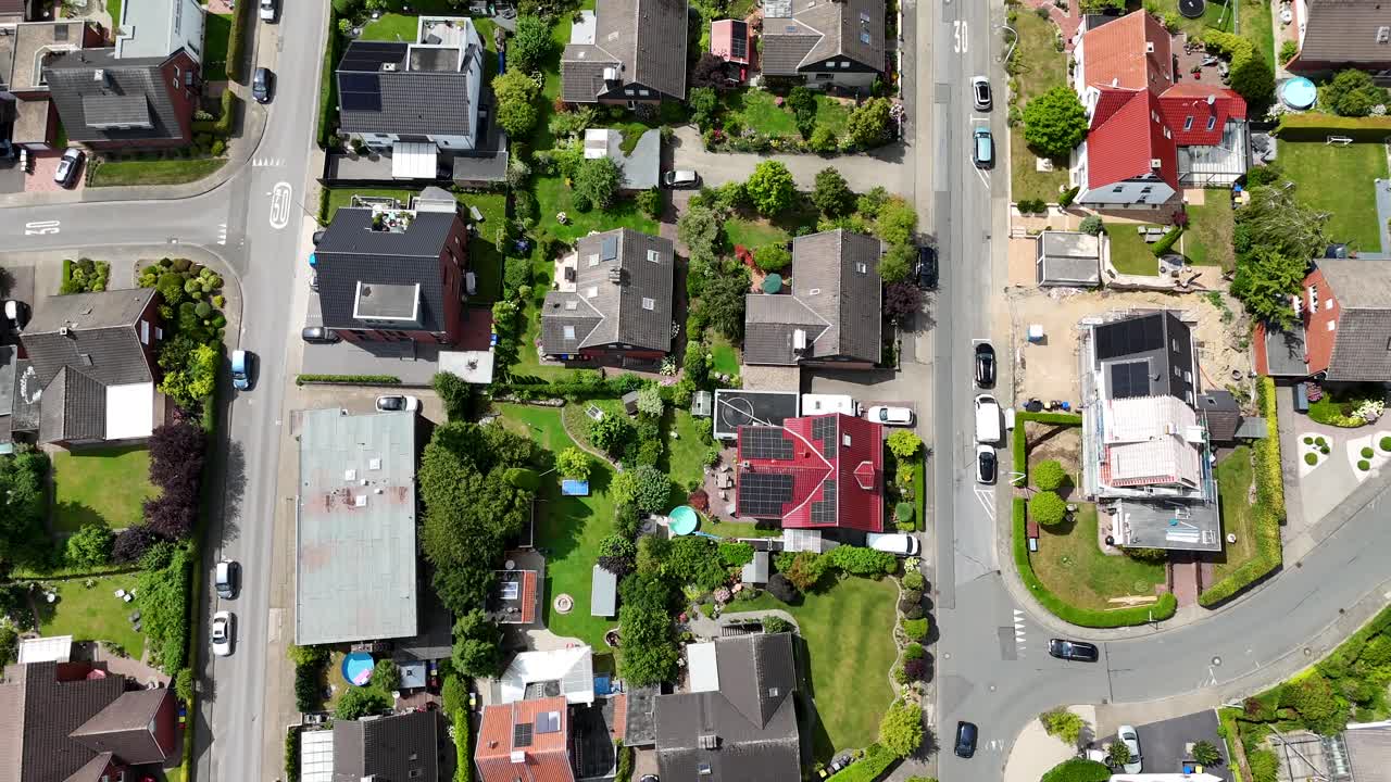 Aerial flyover small american city village at sunny day. Cars on street ...