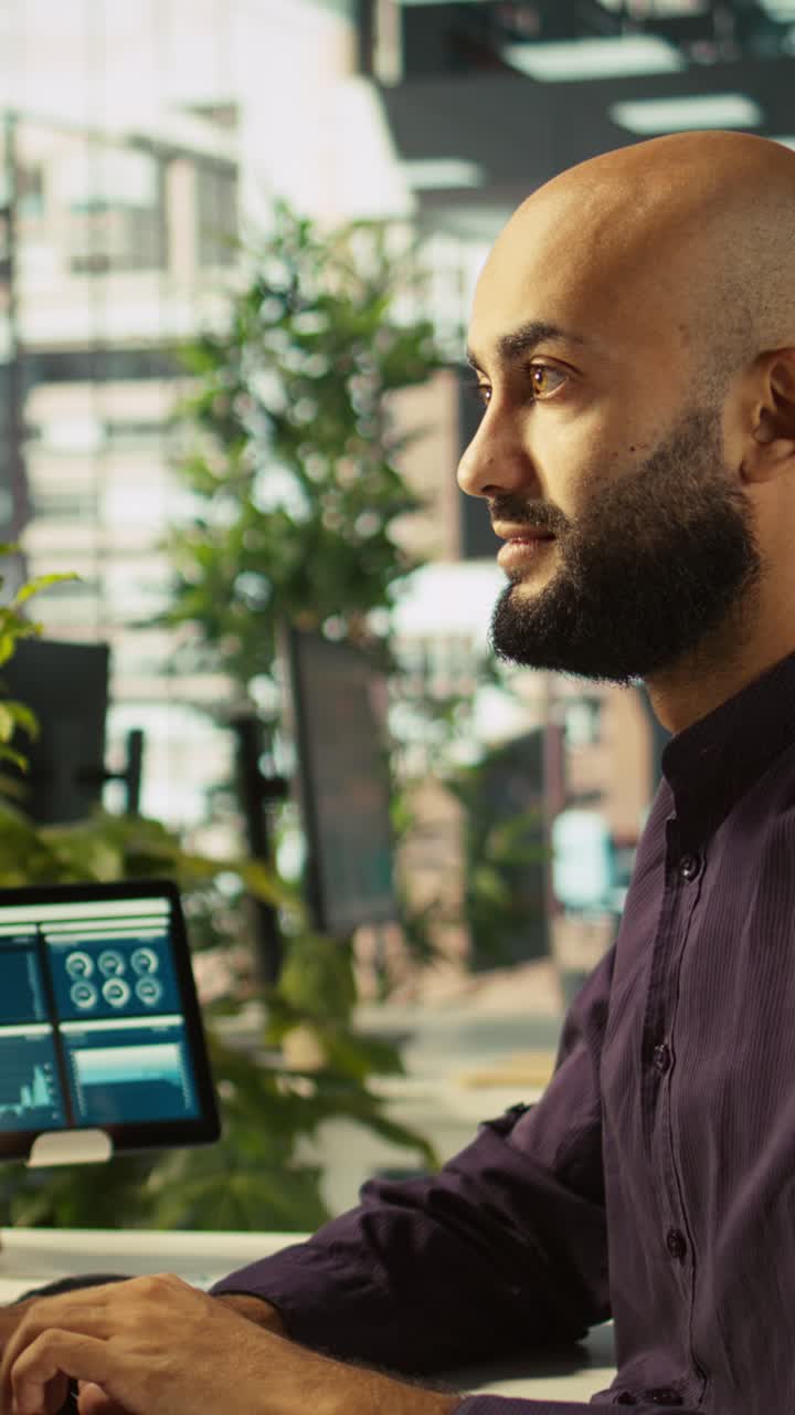 Vertical video Startup staff member working to hit revenue performance ...