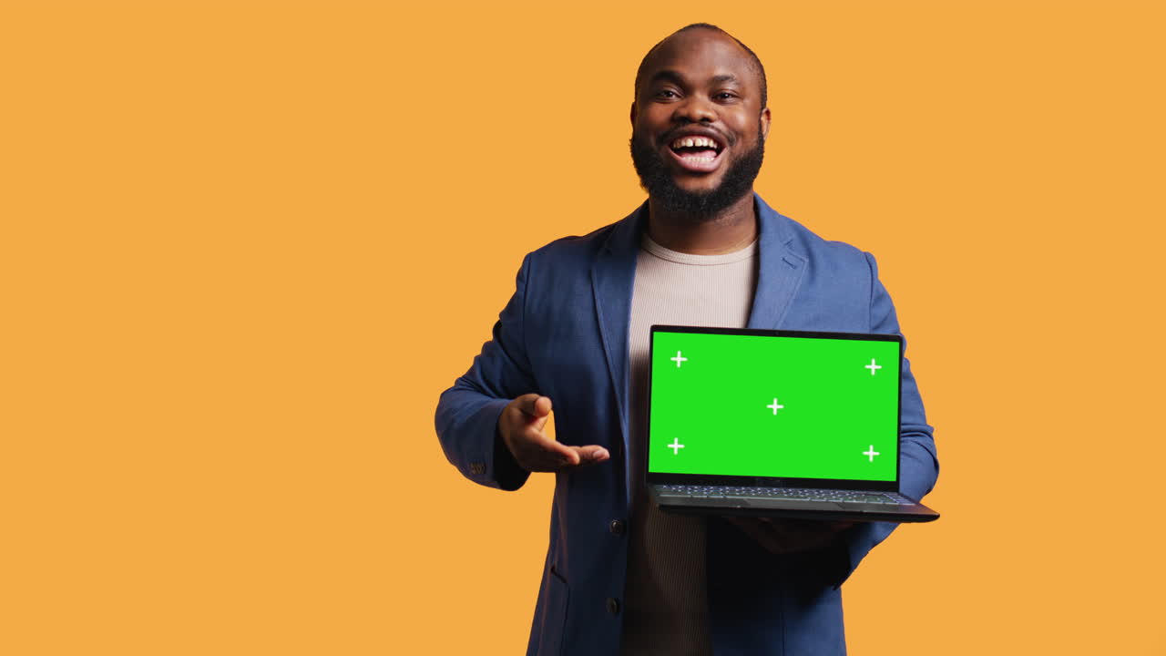 Premium stock video - Cheerful person pointing towards chroma key ...