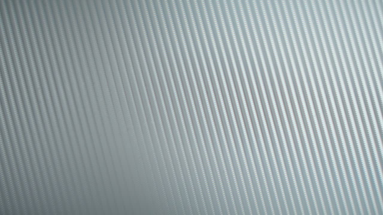 Premium stock video - Two pieces of acrylic glass forming a moire ...
