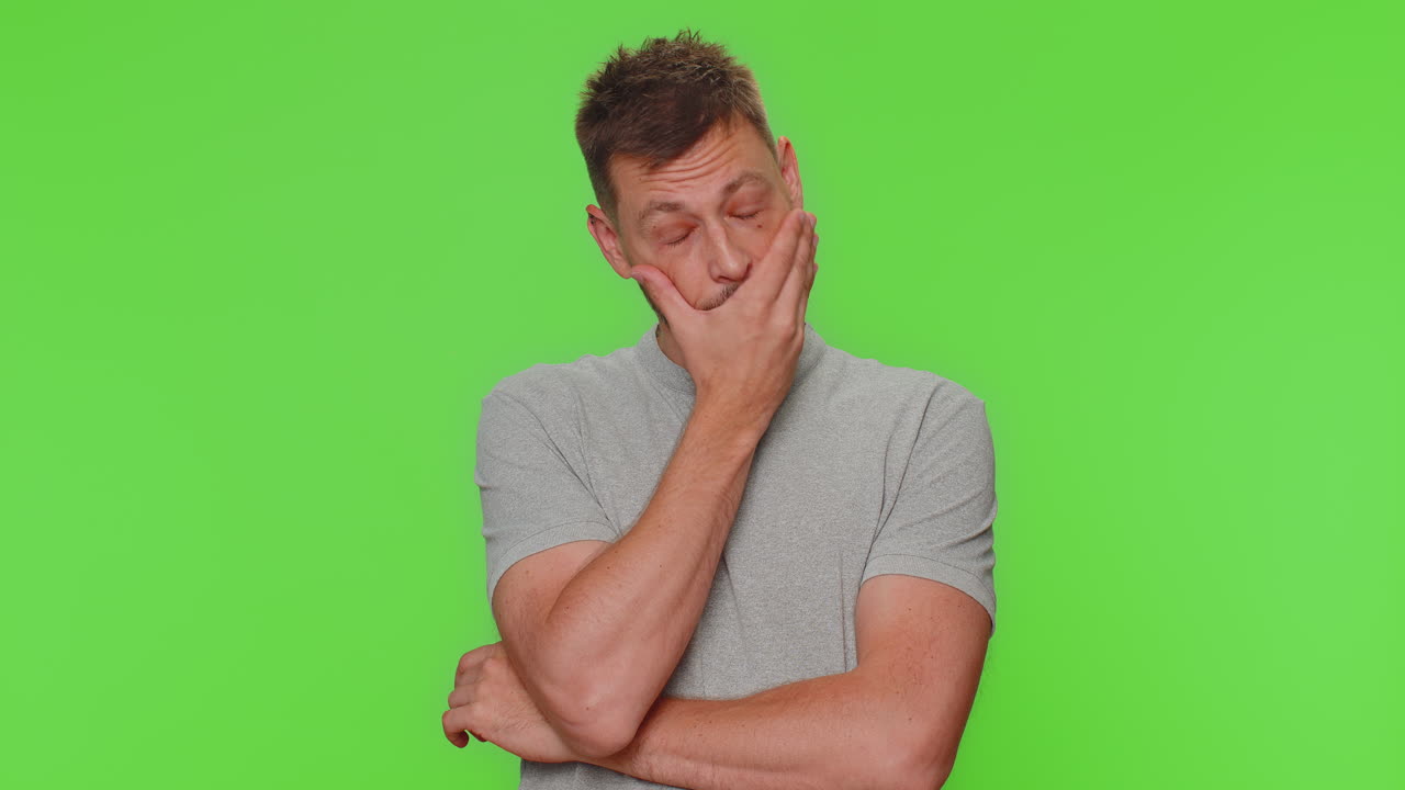 Upset handsome young man making face palm gesture, feeling bored ...