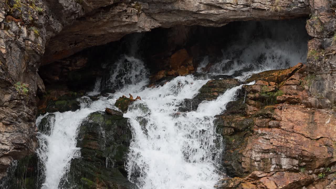 Close Up Of A Beautiful Waterfall In Glacier National Park, Running ...
