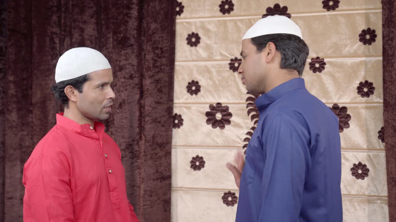 Premium stock video - Two sad muslim men talking to each other