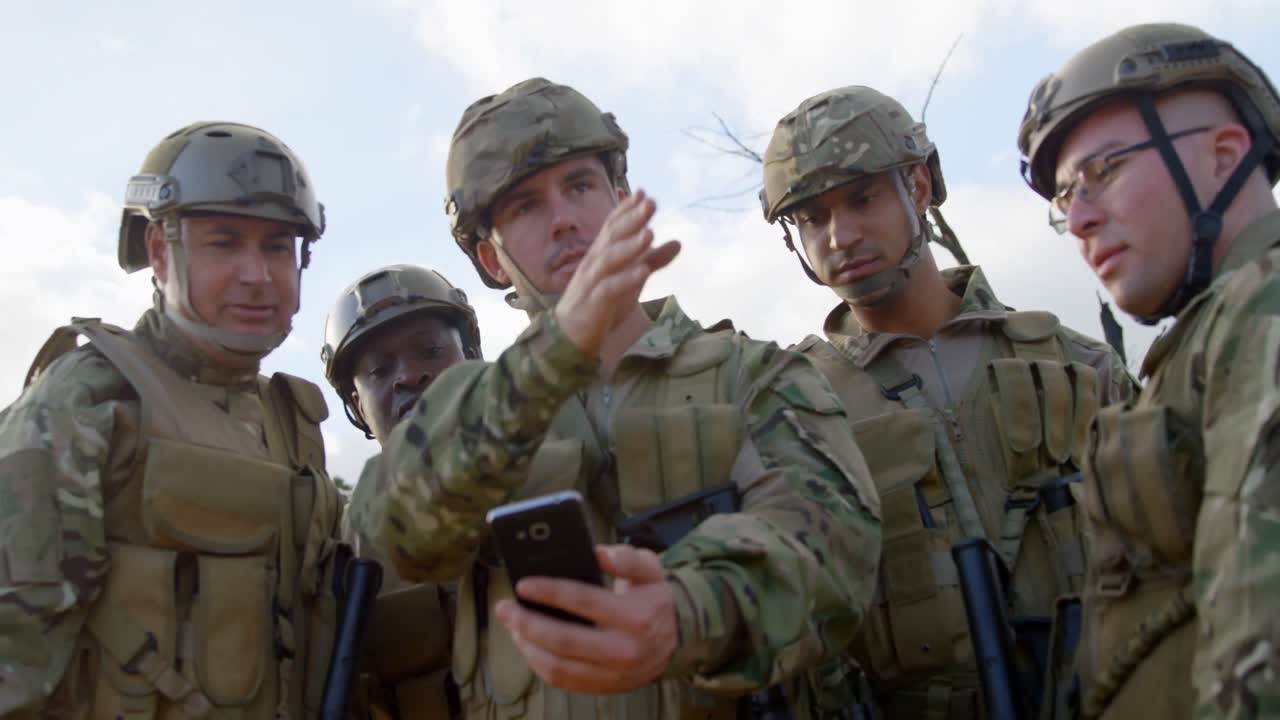 Front View Of Military Soldiers Using Mobile Phone During Training 4k ...