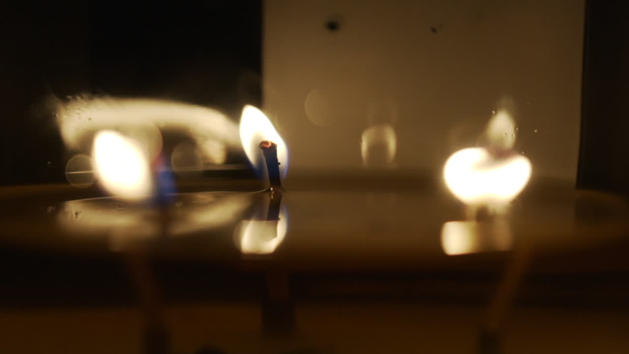 Premium stock video - Macro focus pull of candle wicks