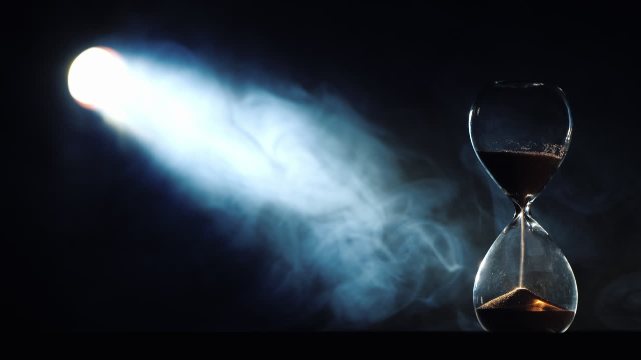 Premium stock video - Bright beam of the spotlight illuminates the ...