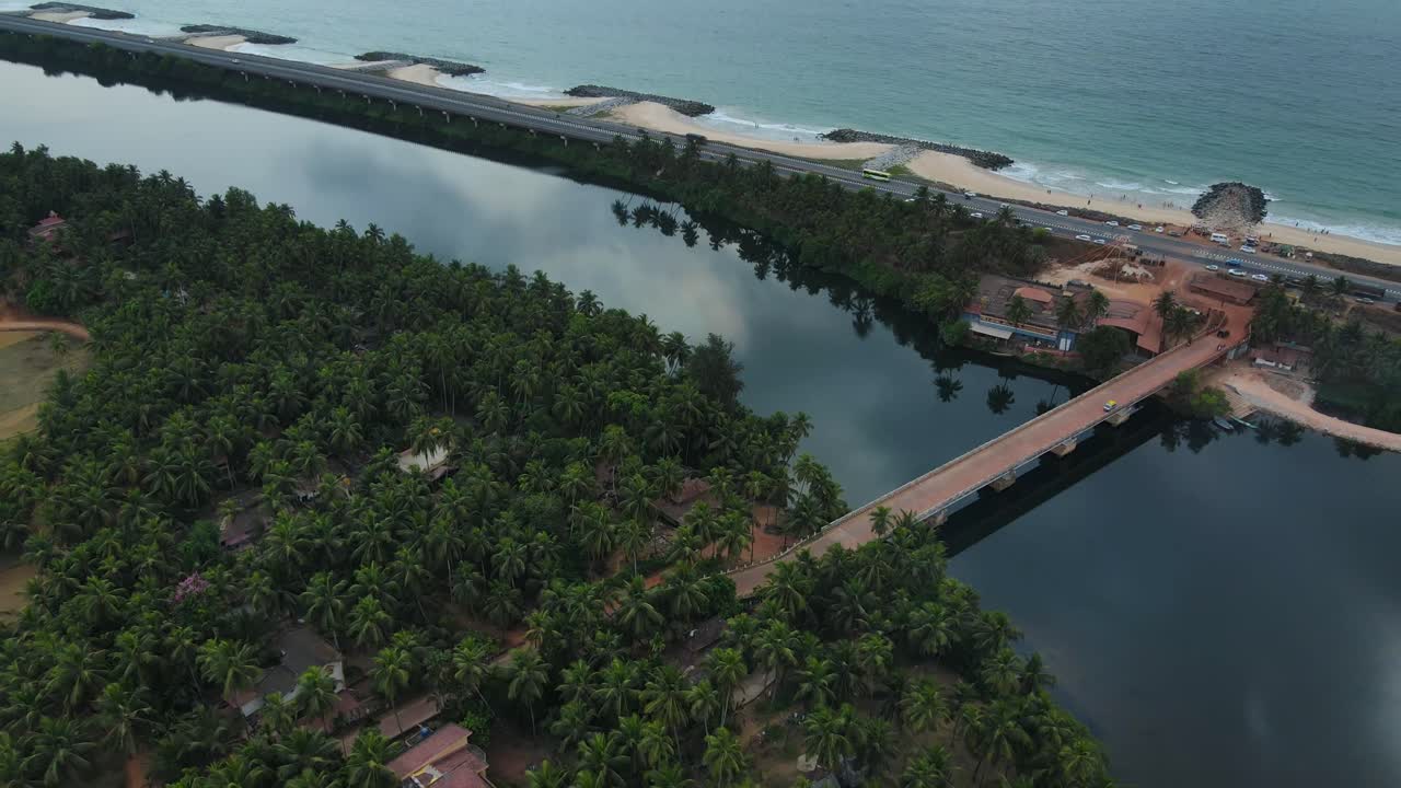 Aerial view of a bridge over a river in Kerala, India, with a coastal ...