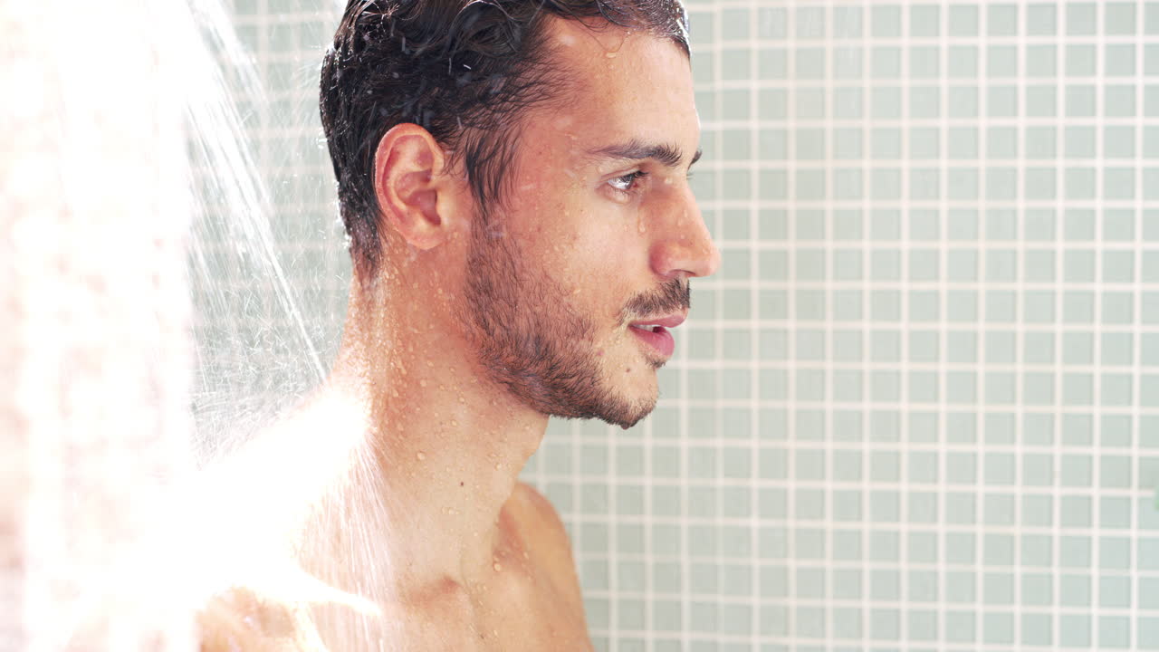 After a long day, a shower feels great | Premium Stock Video Footage