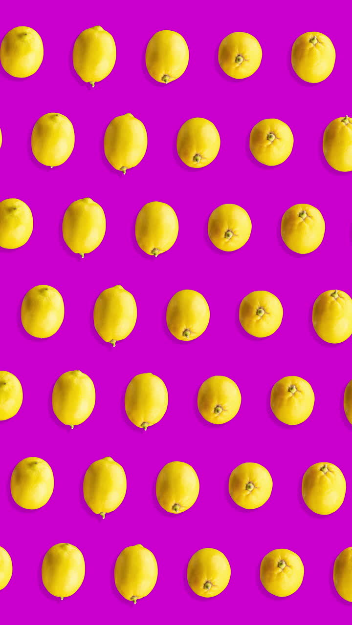 Premium stock video - Pattern of animated lemons in vertical