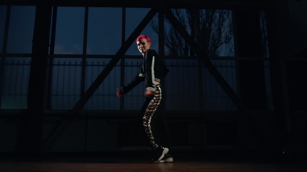 Stylish female dancer practicing in evening in class. beautiful woman ...