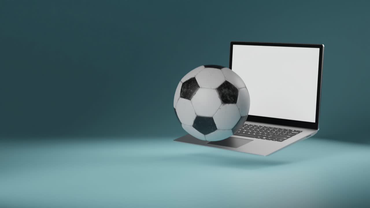 Premium stock video - Football in front of laptop with white screen ...
