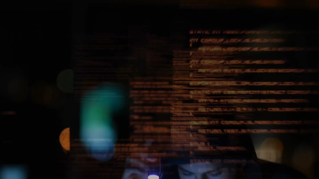 Hacker With Flashlight And Coding Moves On The Foreground Free Stock ...