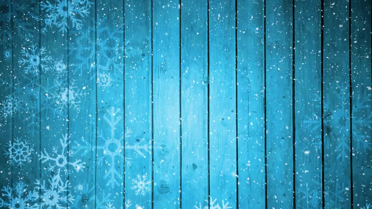 Premium stock video - Snow falling on blue background