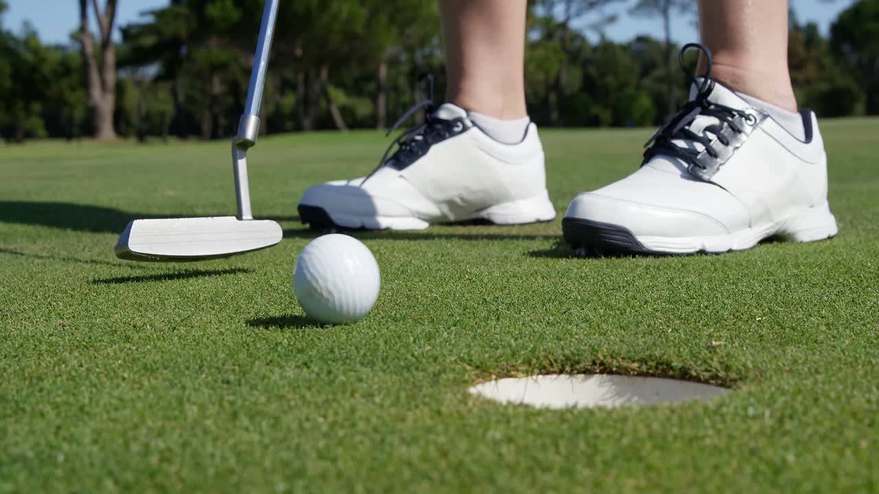 Premium stock video - Golfer playing golf