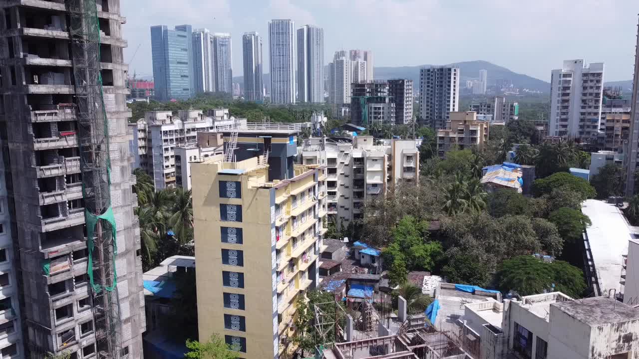 Drone footage of india mumbai goregaon bird's eye view of green city ...