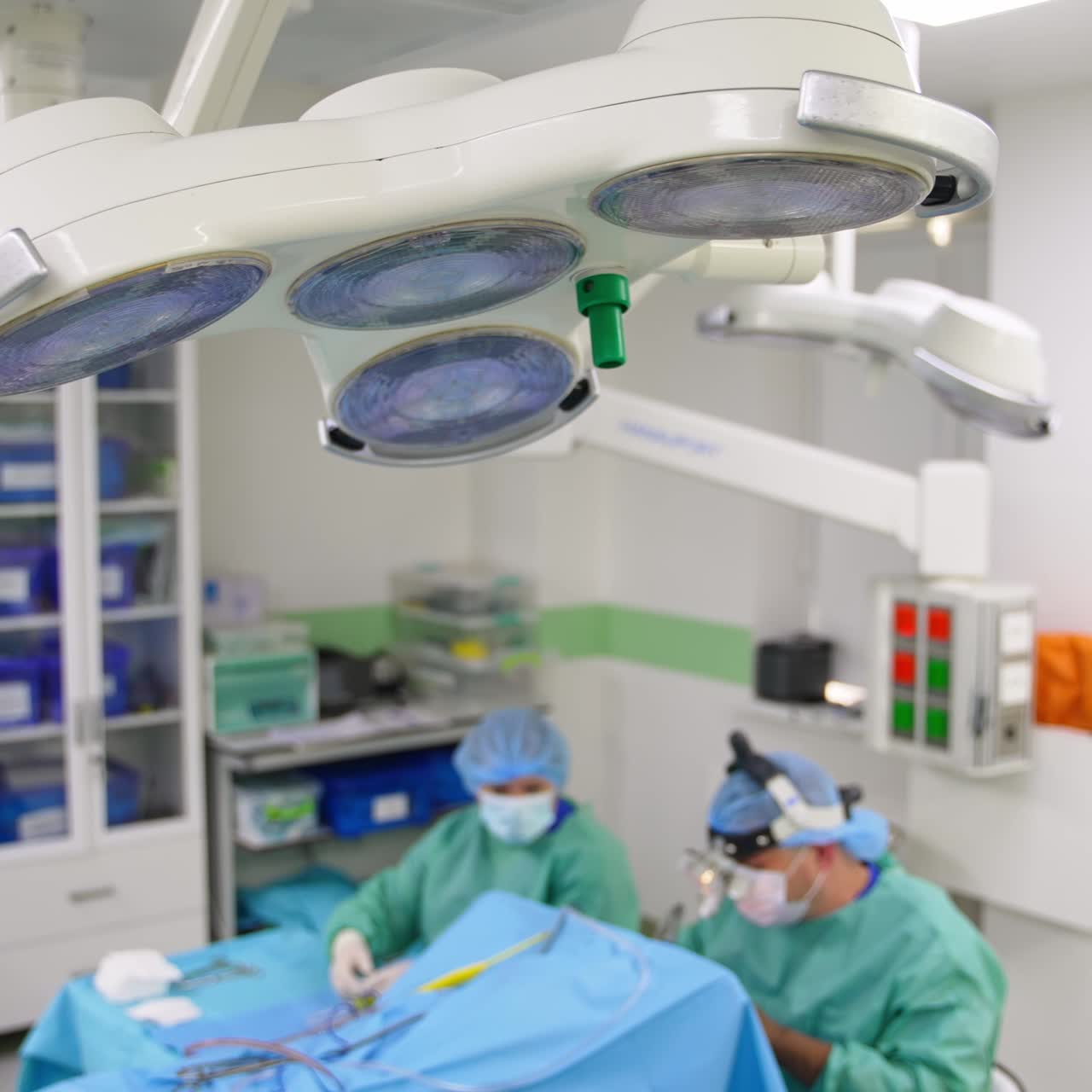 Big lamp hanging in the surgery room over the operating table. Close up ...