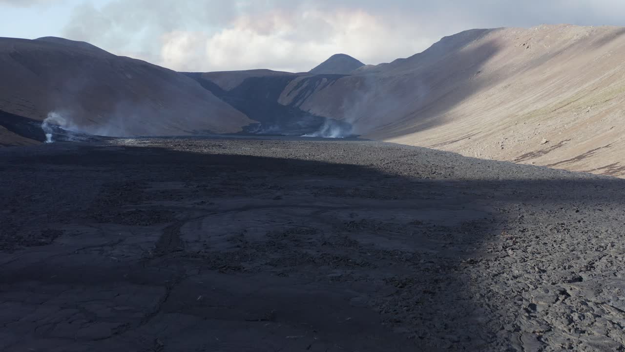 Natthagi valley in Iceland with black basalt flow from volcano eruption ...
