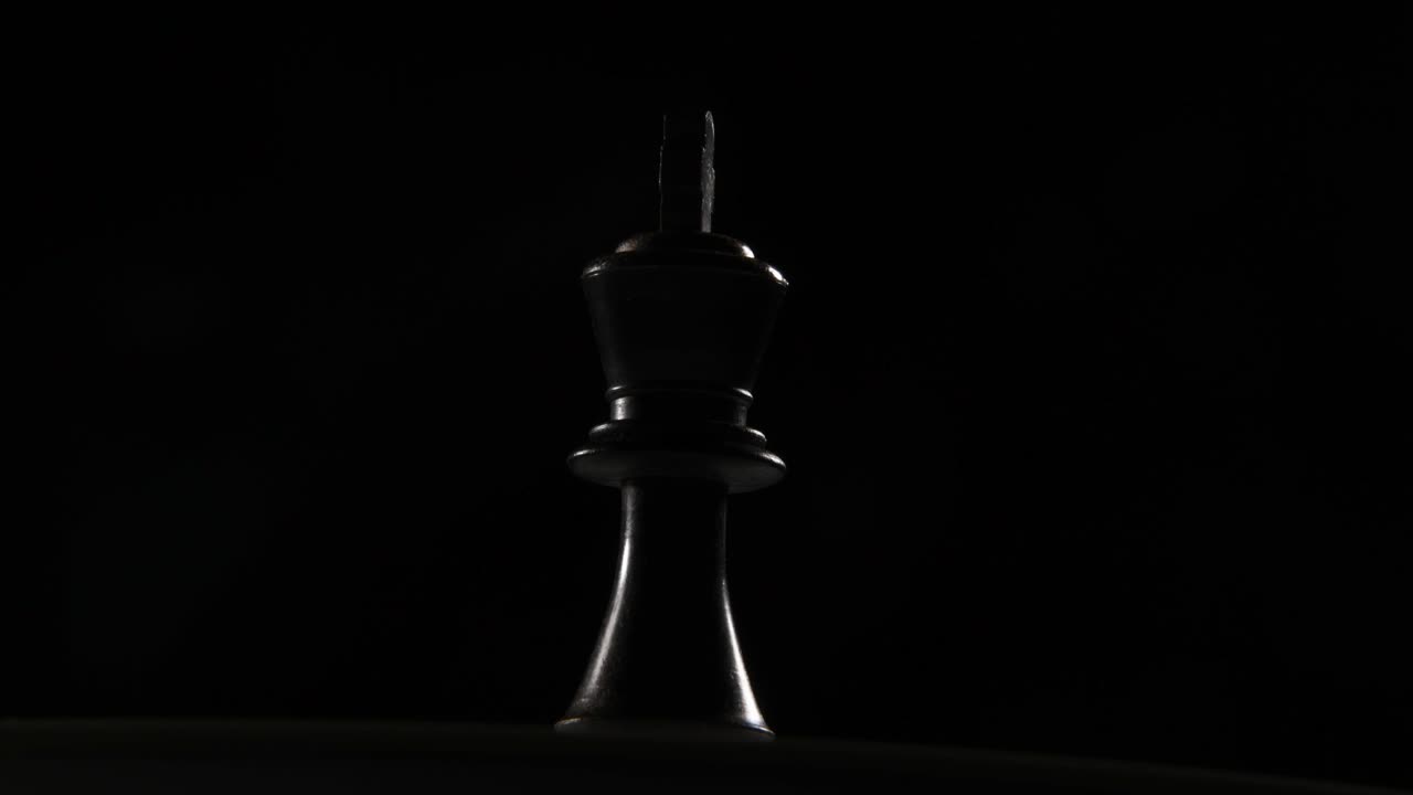 Premium stock video - Cinematic shot of a queen chess piece