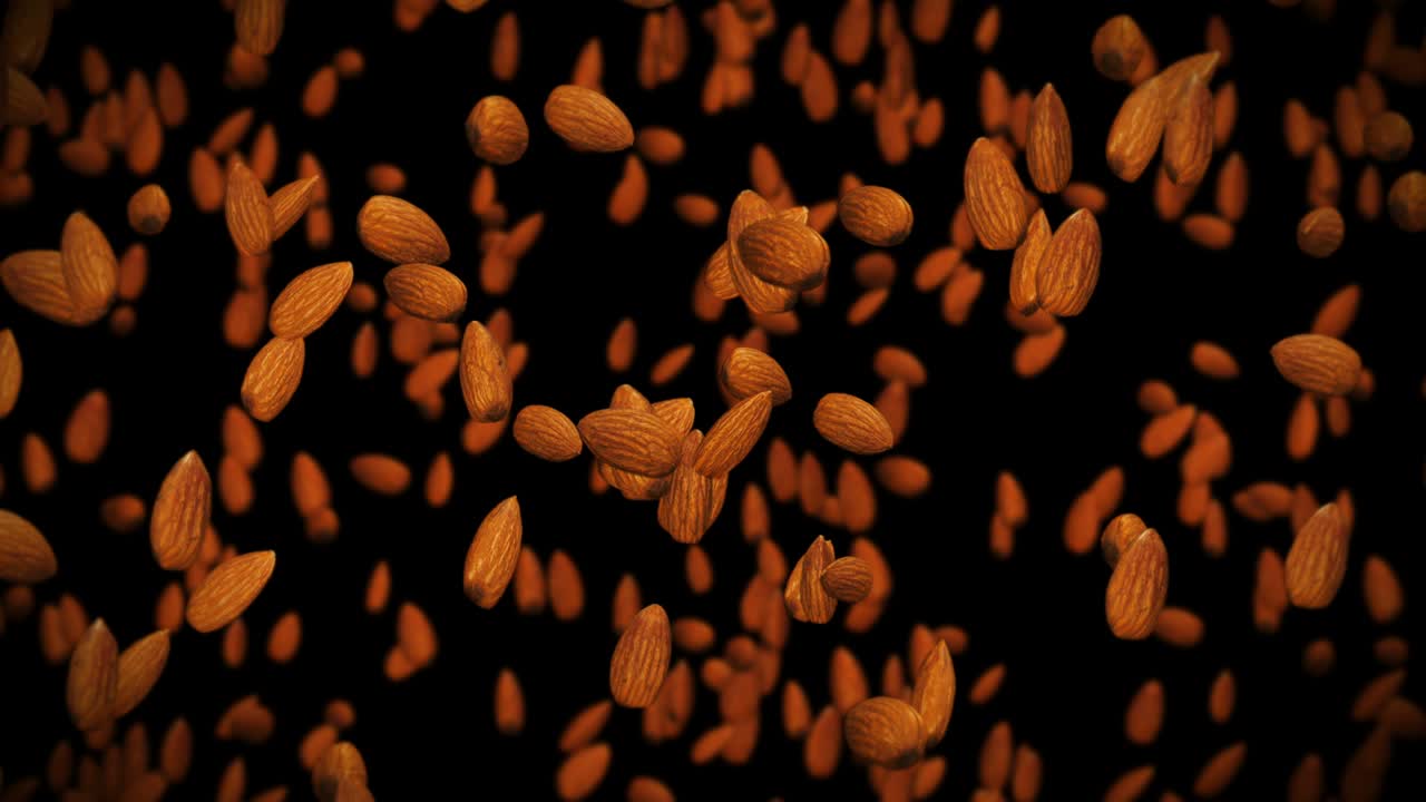 Flying many almonds nuts on black background. Foodstuff, Healthy food ...