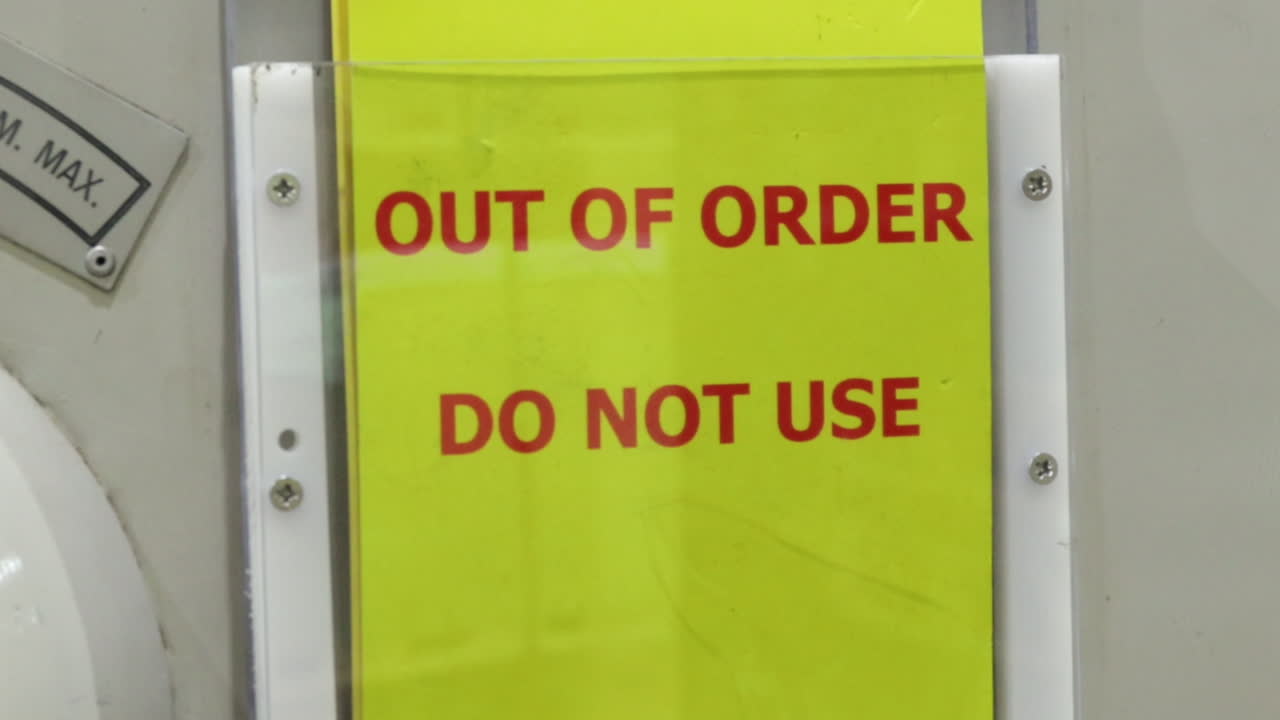 Out Of Order, Do Not Use Sign On A Machine | Premium Stock Video Footage