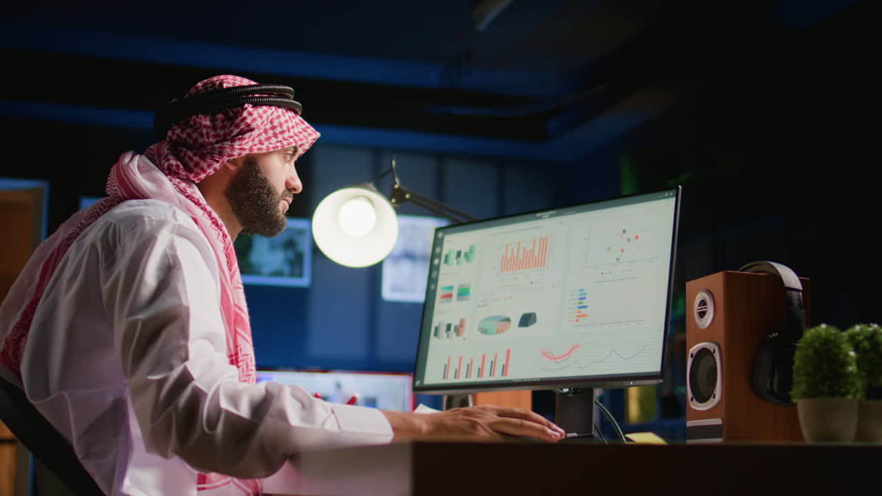 Premium stock video - Worker checking analytics data at home