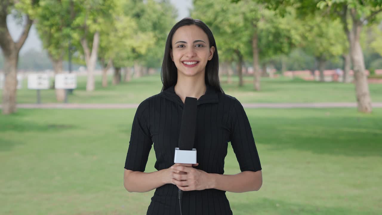 Happy Indian Female News Reporter Smiling Free Stock Video Footage ...