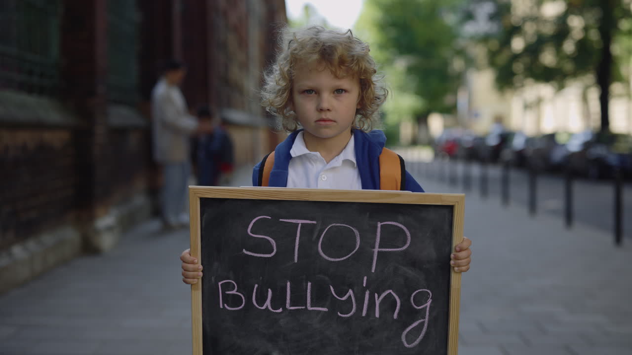 child protesting bullying | freepik