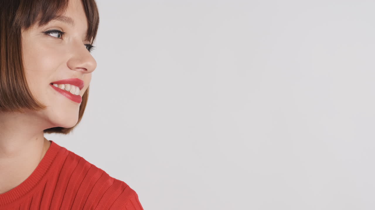 Free stock video - Smiling woman looking at front