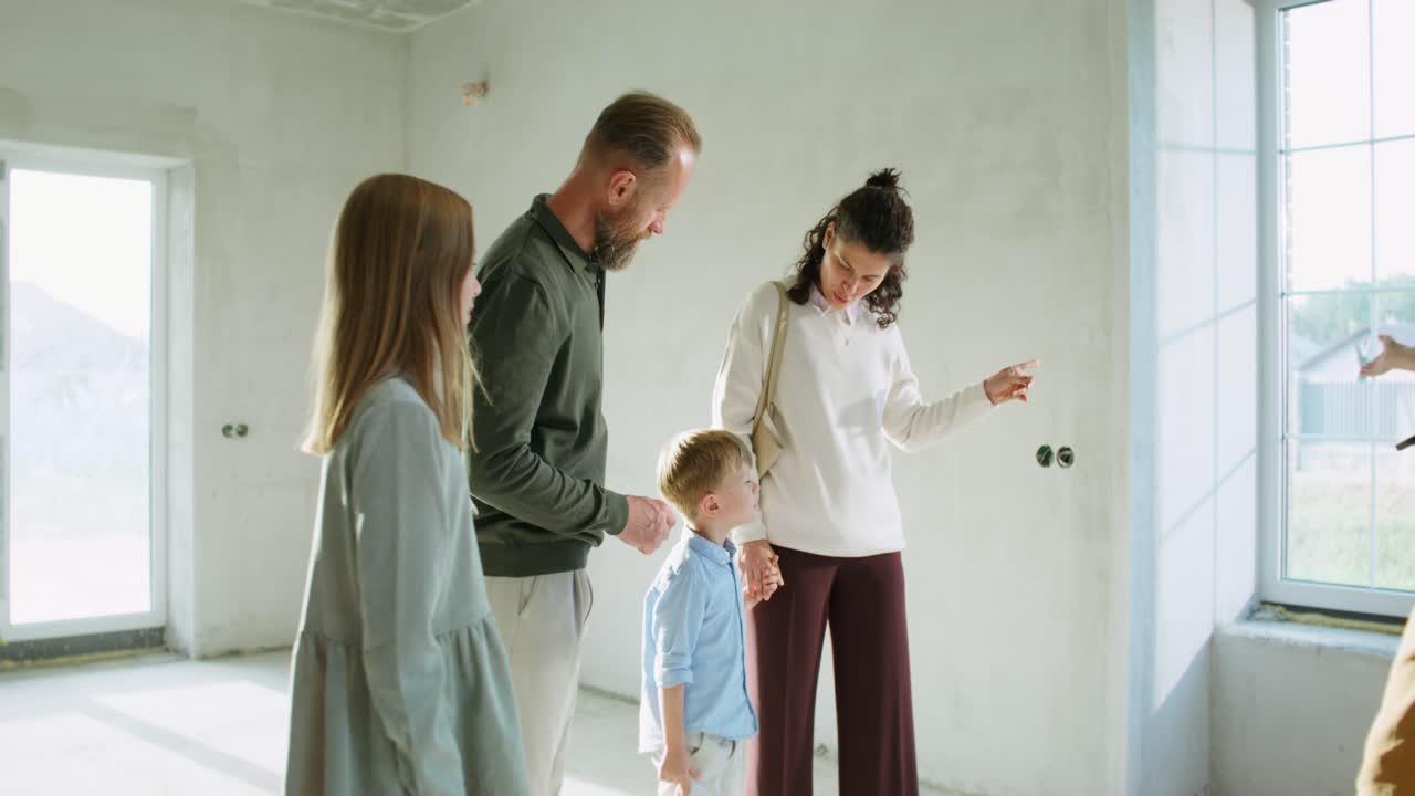 Family Viewing a New Home | Premium Stock Video Footage