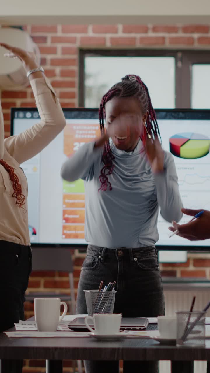 Business Team Celebrating Success with High-Five | Premium Stock Video ...