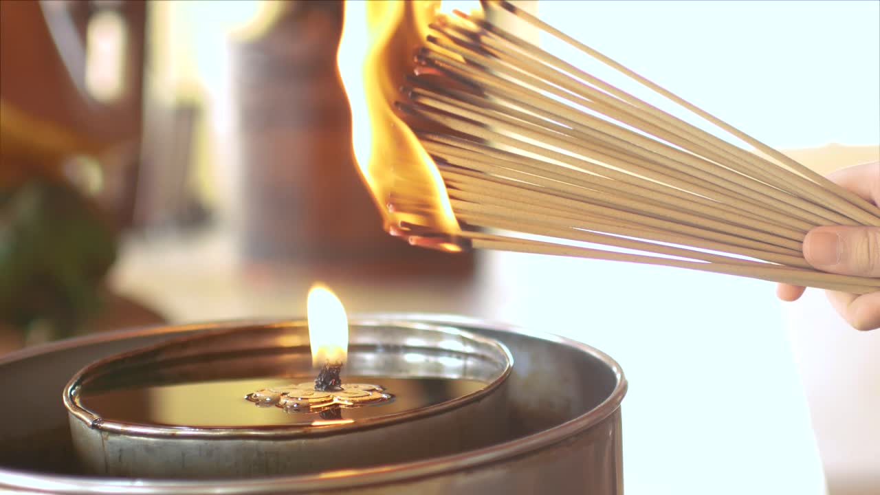 Premium stock video - Selective focusing 4k video on the smoke stick ...