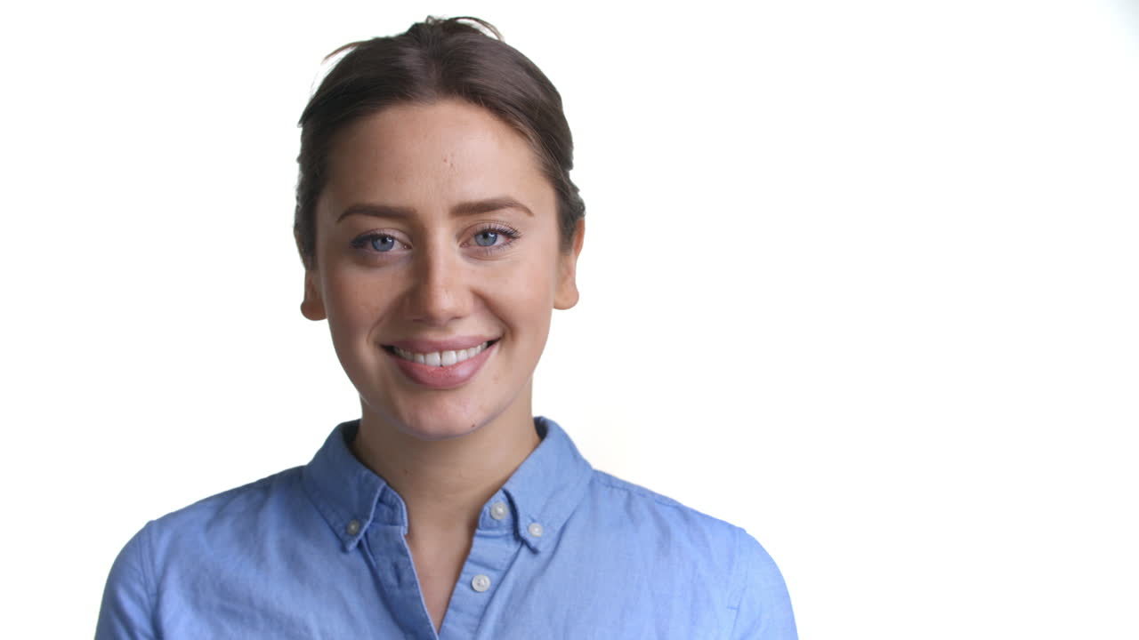 Premium stock video - Close up of attractive young woman smiling into ...