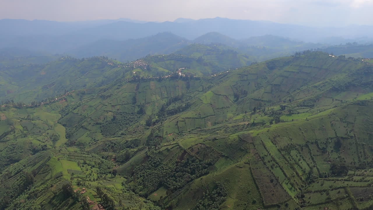 Stunning Flyover Of Fields And Pastures On Steep Jungle Hills In Congo ...