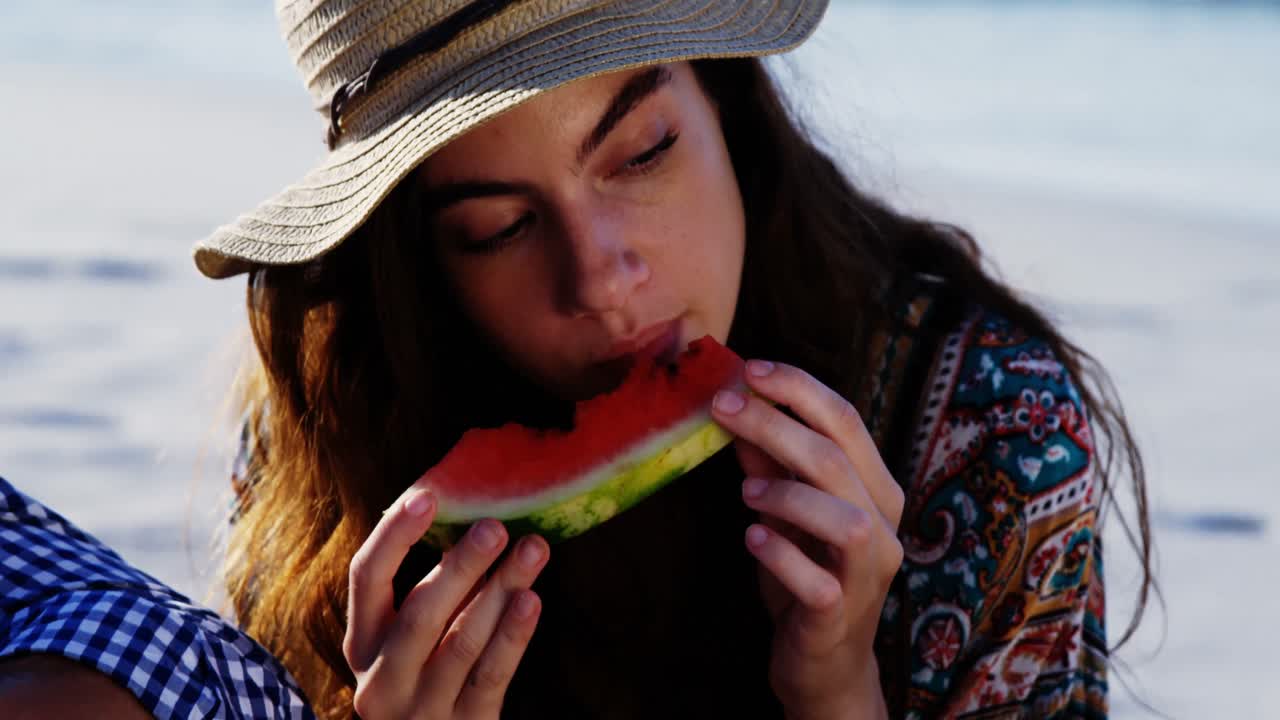 Premium stock video - Beautiful woman having a watermelon 4k
