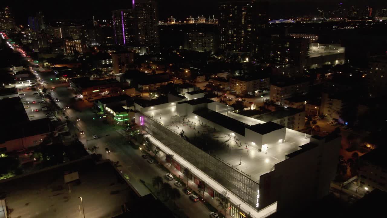 Miami Aerial Descent To Night Time Exercise Class On Parkade Roof Top ...