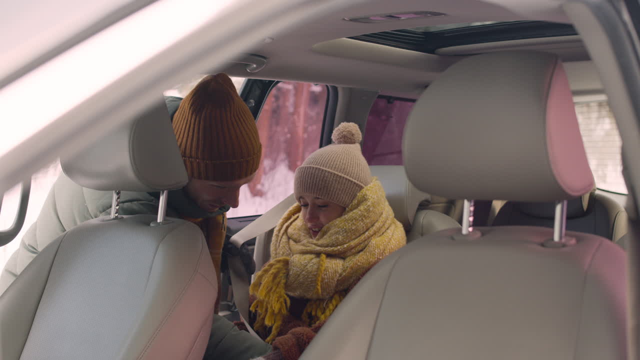 Girl Sitting In The Back Seat Of A Car Free Stock Video Footage
