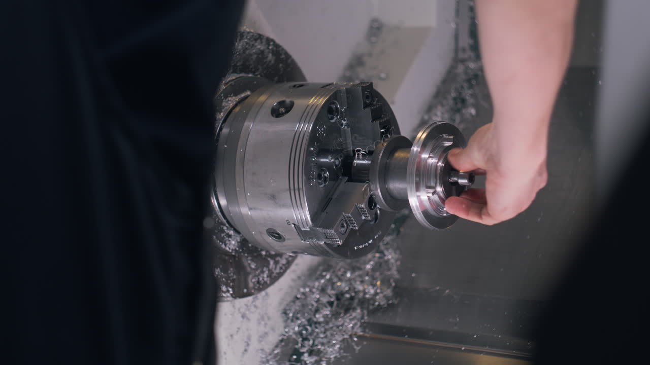 Premium stock video - Male technician measures cinema lens workpiece on ...