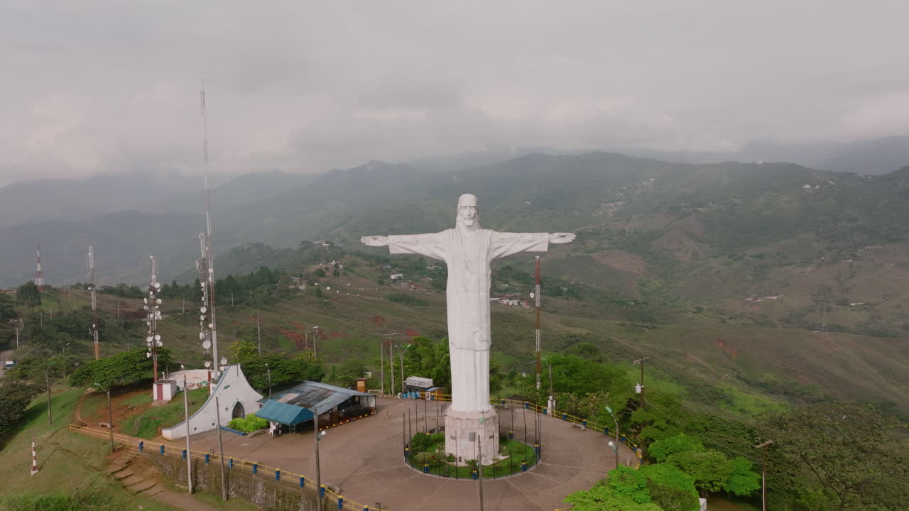 Aerial Zoom Out Reveal Of The Cristo Rey Jesus Statue On Top Of A ...