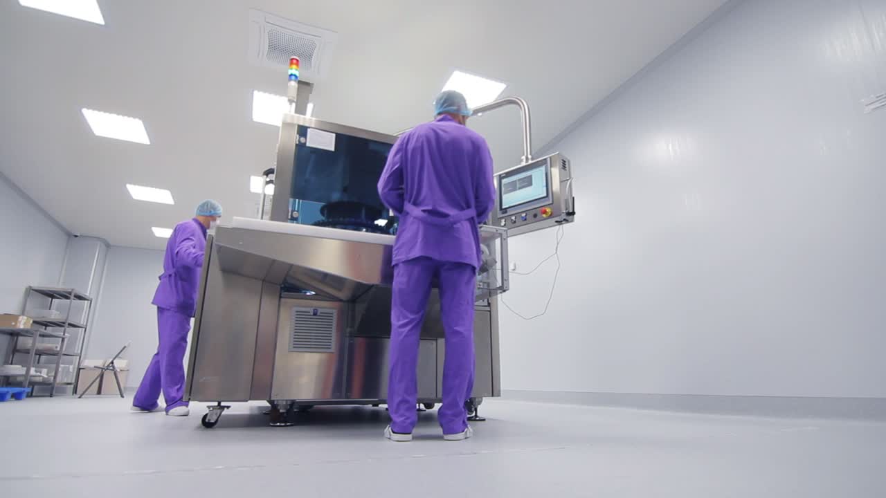 Factory operator control pharmacy production machine. pharma ...