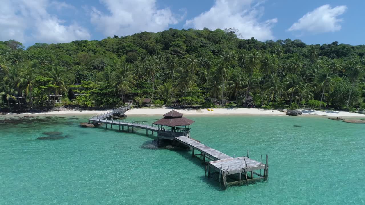 Aerial Orbit Of Gazebo On A Dock Out In The Ocean On A Perfect Tropical ...