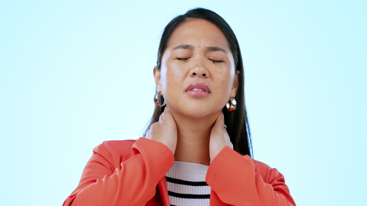 Neck, pain and injury of woman in studio | Premium Stock Video Footage