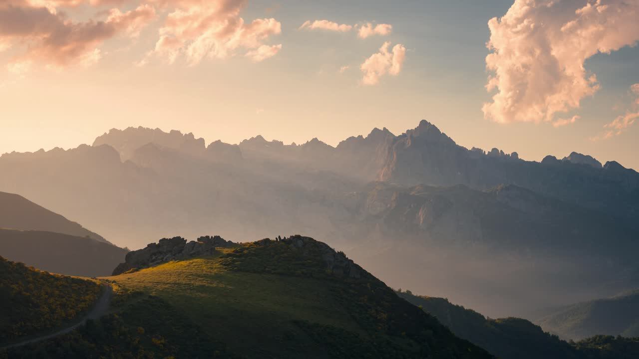 View of picos de europa mountain range with beautifull golden light ...