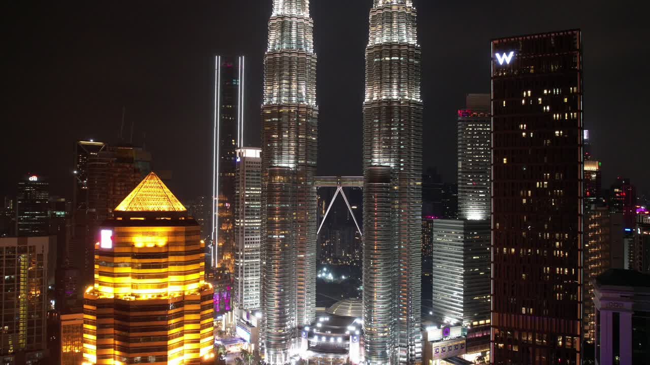 Premium stock video - Aerial night view of klcc or petronas towers